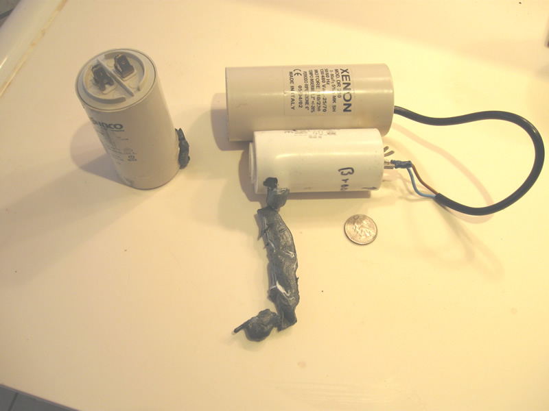 Electronics within capacitor casing?